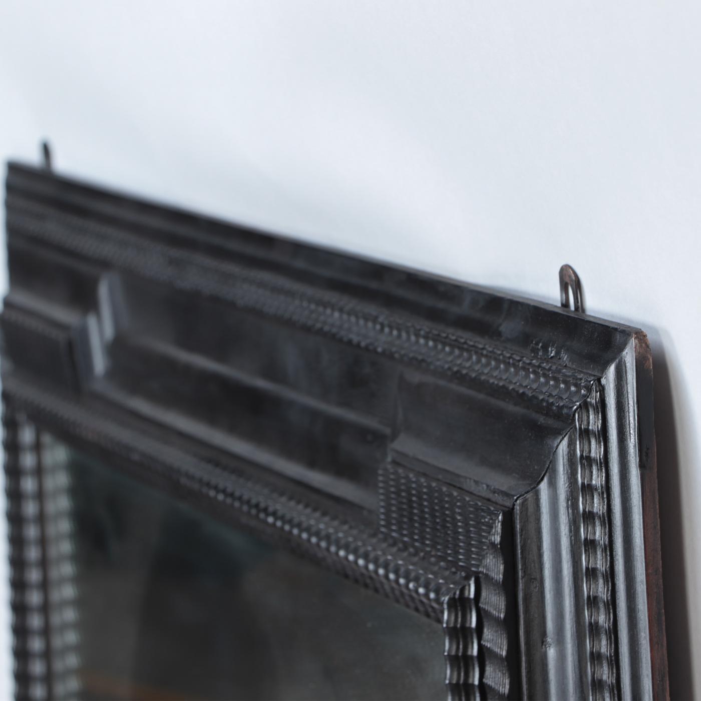 A Large Dutch style ebonIzed frame with ripple carving. Circa 1940.