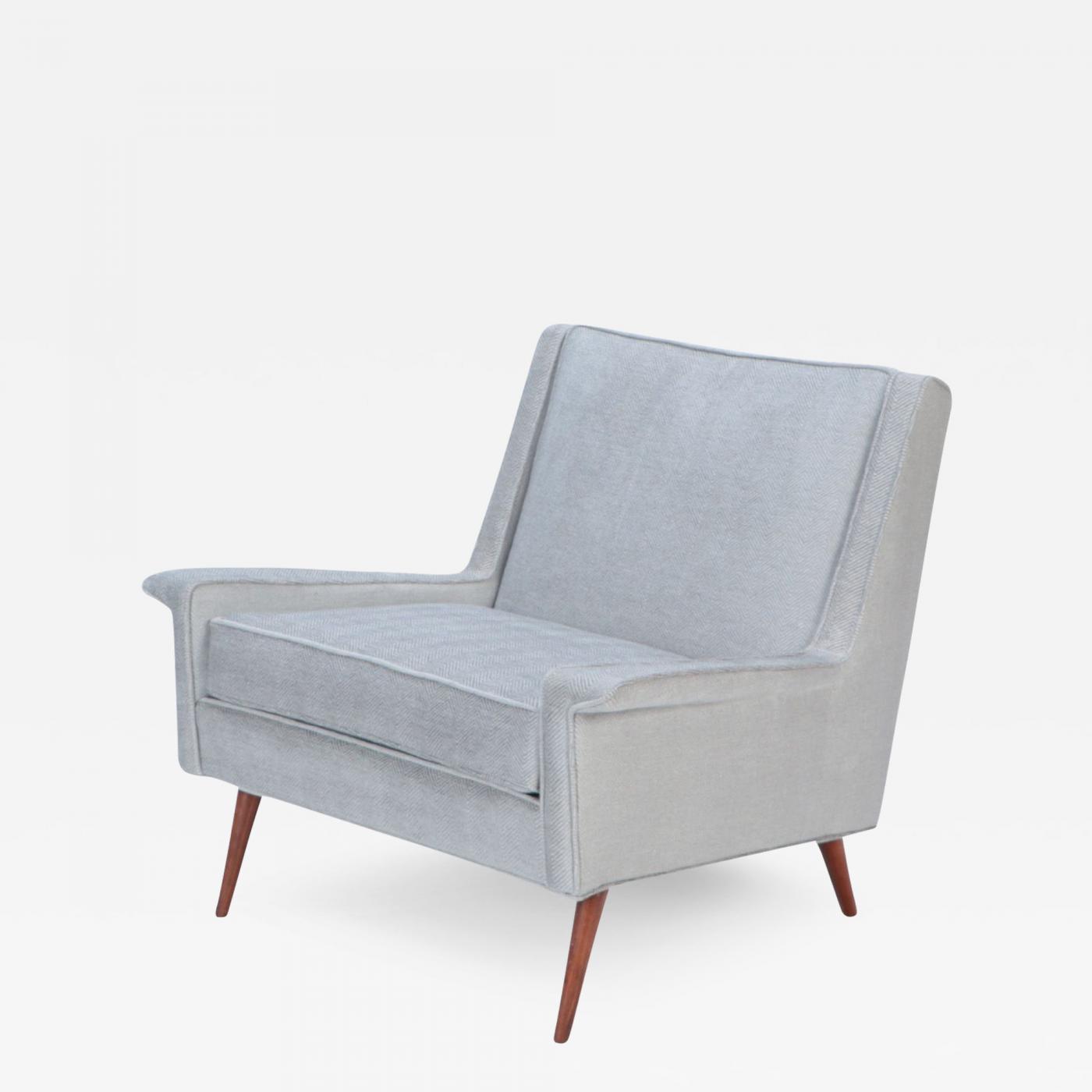 A Mid Century Modern newly upholstered lounge chair, circa 1950