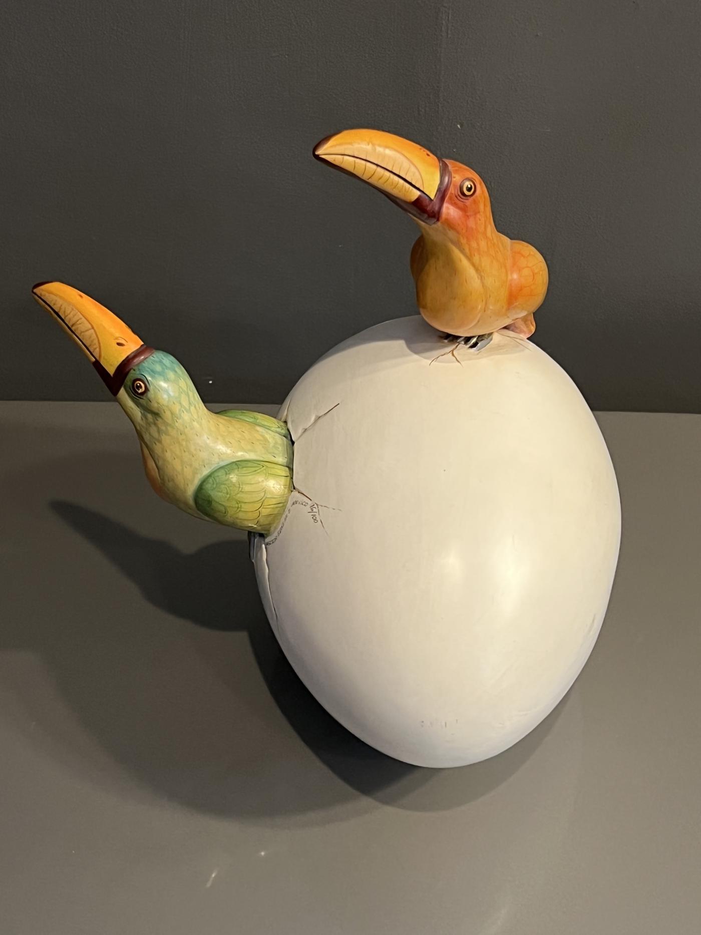 TOUCANS HATCHING OUT OF EGG SCULPTURE BY HECTOR GONZALEZ